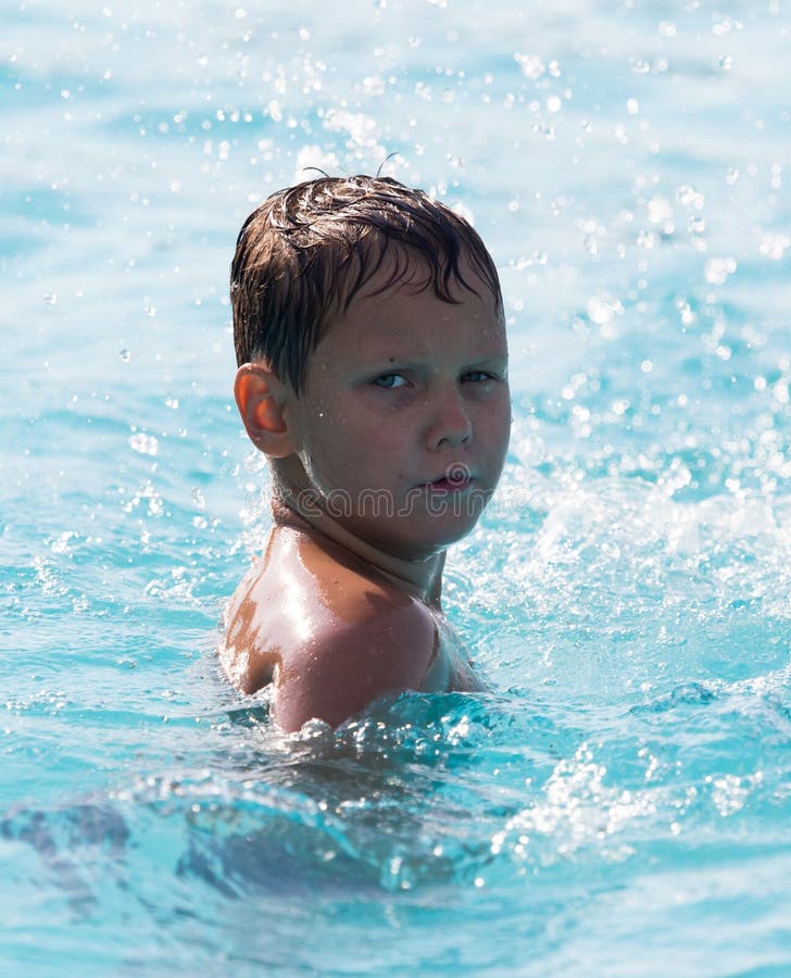 The Boy is Swimming in the Pool Stock Image - Image of summer, play ...