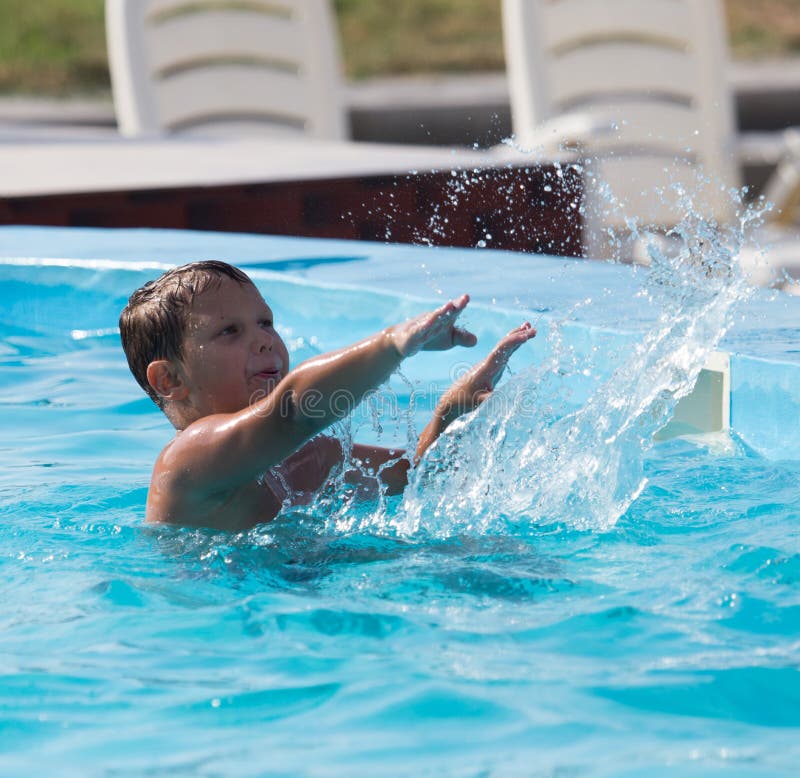 The Boy is Swimming in the Pool Stock Photo - Image of active, young ...