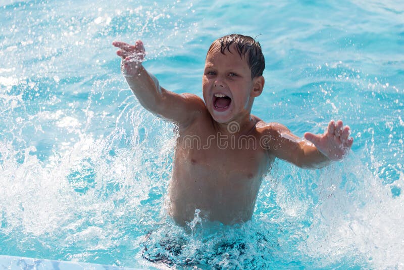The Boy is Swimming in the Pool Stock Photo - Image of splash, swim ...