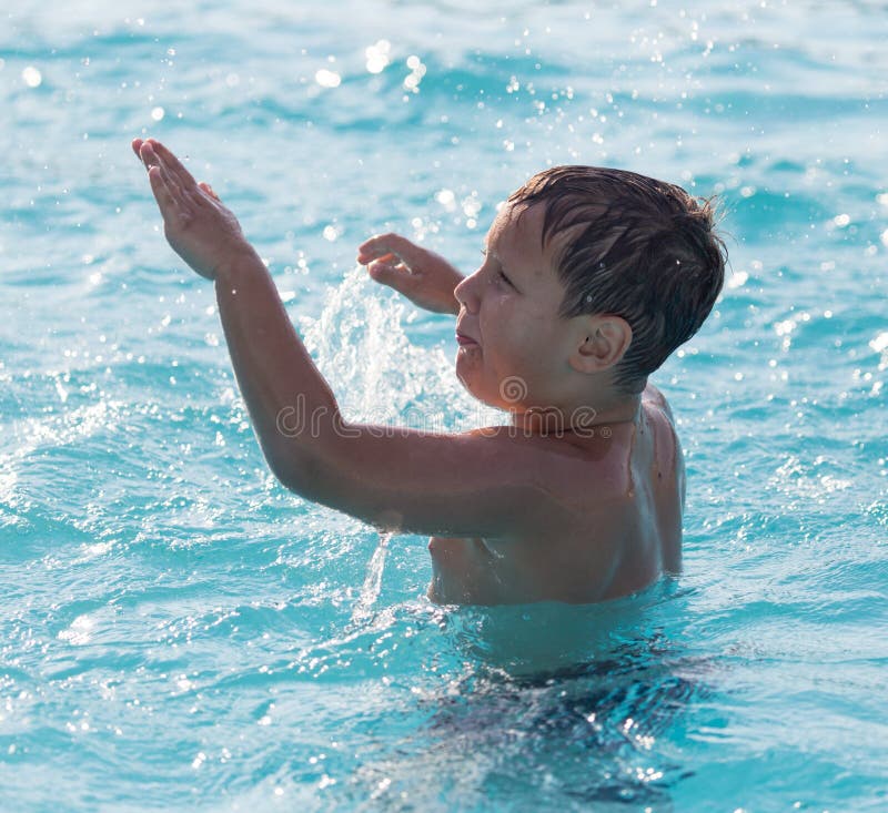 The Boy is Swimming in the Pool Stock Image - Image of leisure, people ...