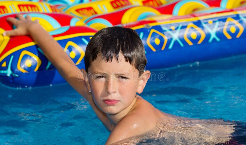 Boy in swimming pool stock photo. Image of pool, active - 25626764