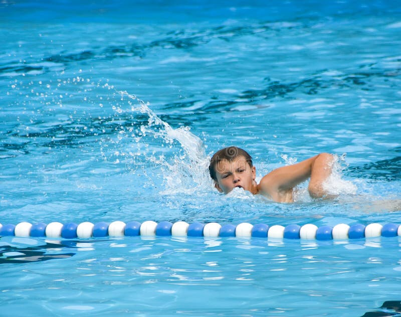 Boy swimming in pool stock image. Image of pool, lines - 6026957