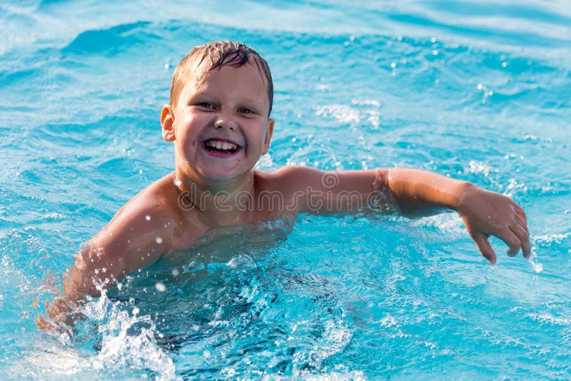 The Boy is Swimming in the Pool Stock Photo - Image of activity, cute ...