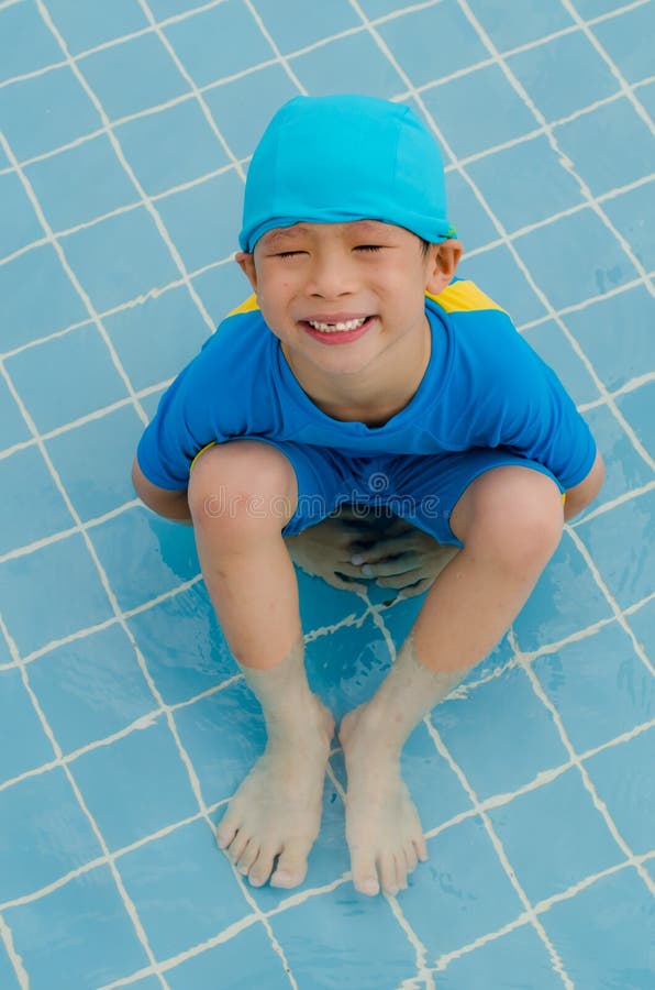 Boy in swimming pool stock photo. Image of play, blue - 34918322
