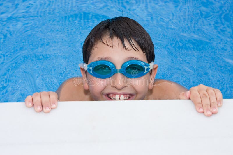 Boy Swimming in the Pool with Goggles and a Big G Stock Photo - Image ...