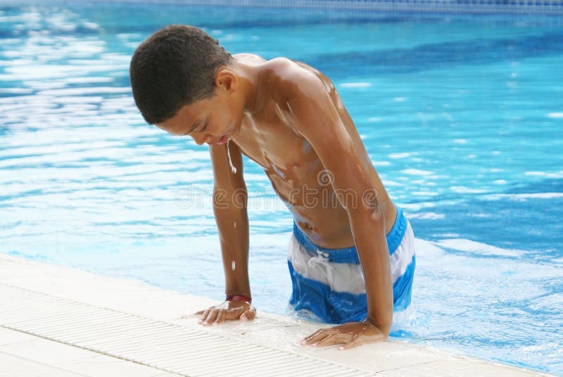 Boy at swimming pool. stock image. Image of beautiful - 77491019