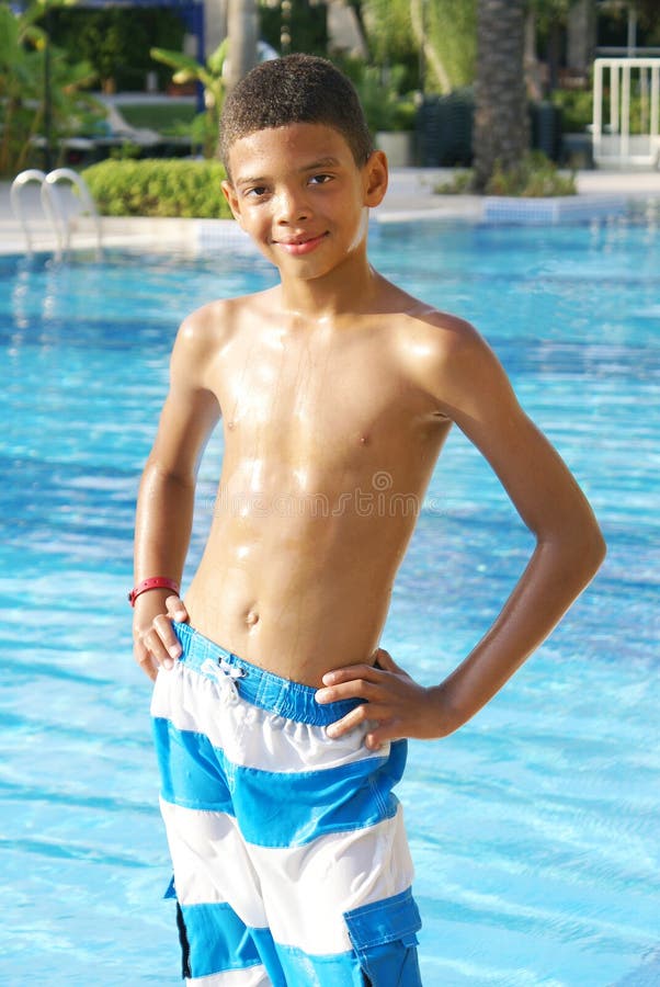 Boy at swimming pool. stock photo. Image of people, race - 77490710