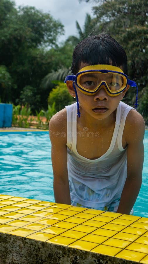 A Boy Swimming Using Goggles Stock Image - Image of outdoors, goggles ...