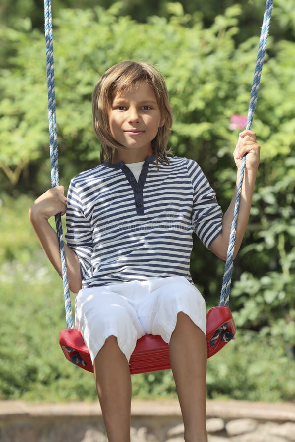 Boy on a swing stock photo. Image of emotions, happiness - 25845958