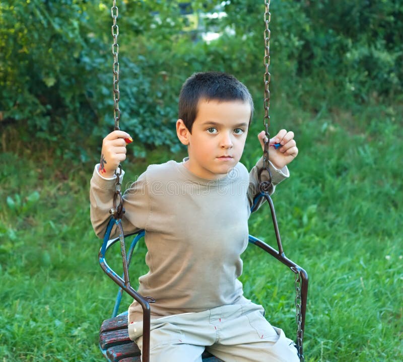 Boy swinging stock photo. Image of summer, playing, children - 19553072