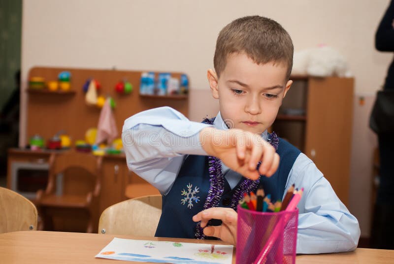 Boy at the table stock photo. Image of close, five, kindergarten - 64956474