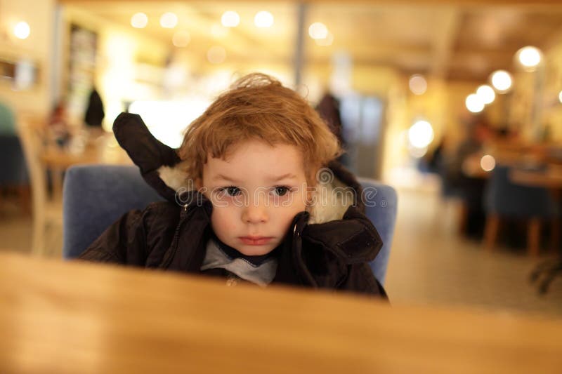 Boy at table stock image. Image of leisure, looking, casual - 36203269