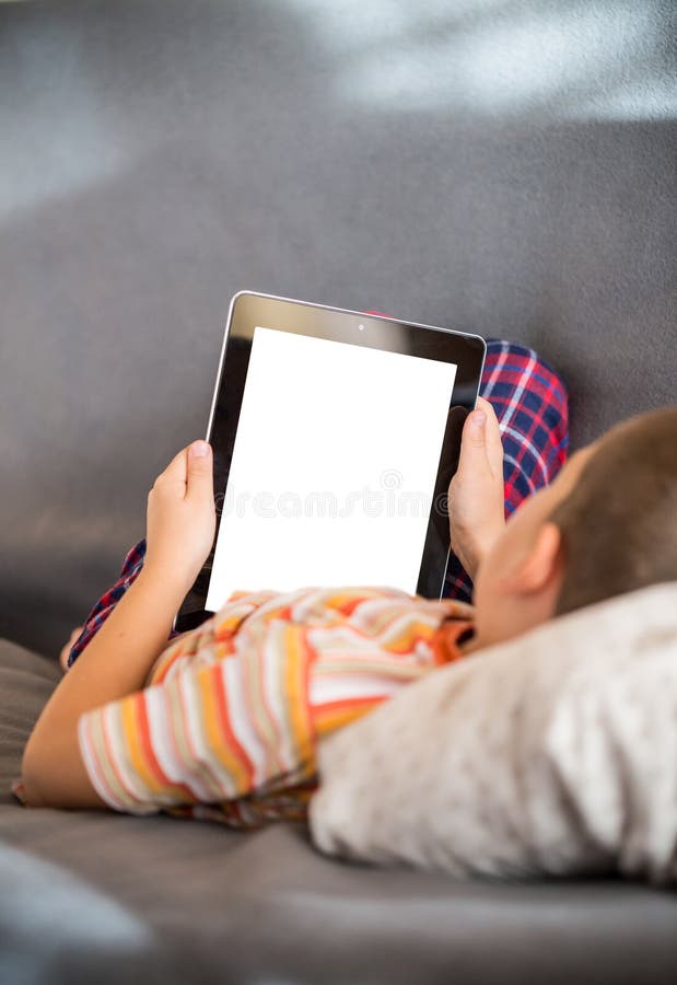 Boy with tablet stock photo. Image of electronic, childhood - 61814186