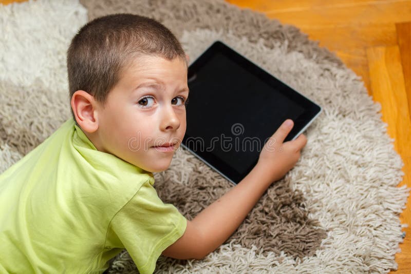 Boy with tablet stock image. Image of tablet, learning - 35383559