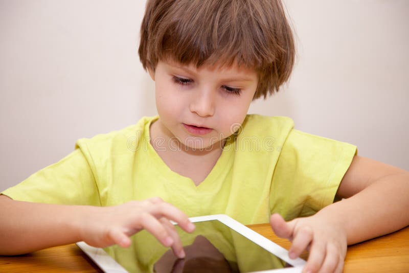 Boy with tablet stock image. Image of caucasian, modern - 51189685
