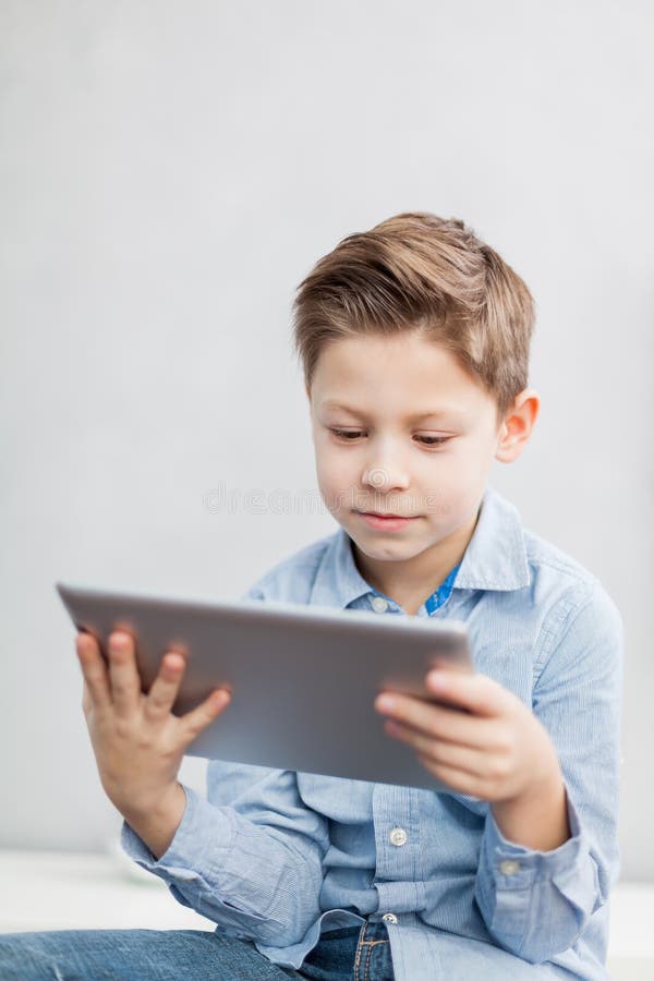 Boy with tablet pc stock photo. Image of wireless, living - 29052356