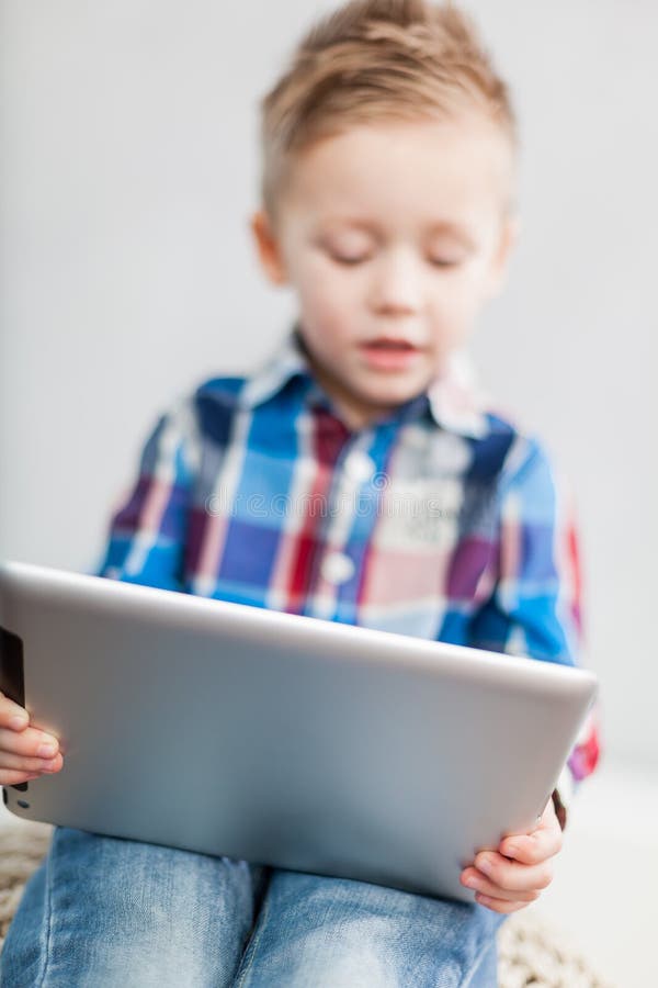Boy with tablet pc stock photo. Image of tablet, home - 29052406
