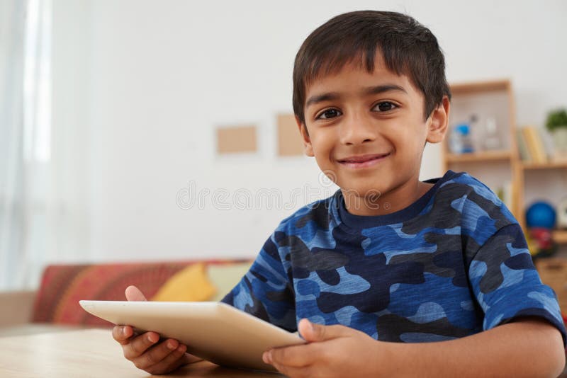 Boy with tablet stock photo. Image of casual, preschool - 72599048