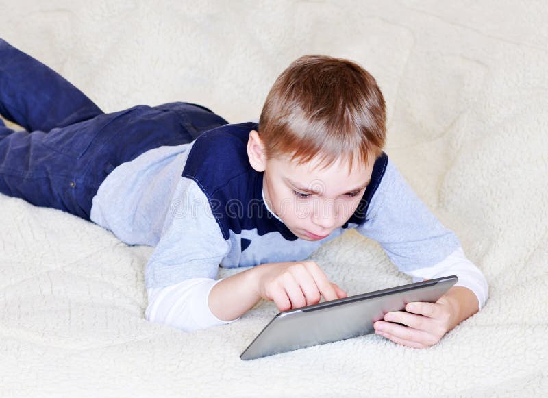 Boy with tablet stock photo. Image of childhood, electronics - 44032762