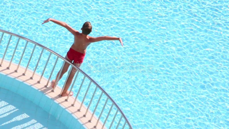 Boy Takes Sunbath Standing on Separating Ledge Stock Footage - Video of ...
