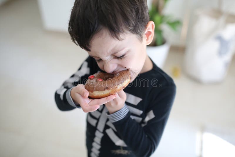 The boy is taking a bite stock photo. Image of kiss - 136251840