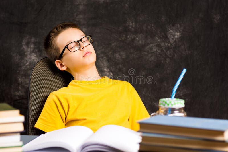 Boy Taking a Nap while Finishing Homework Stock Photo - Image of desk ...