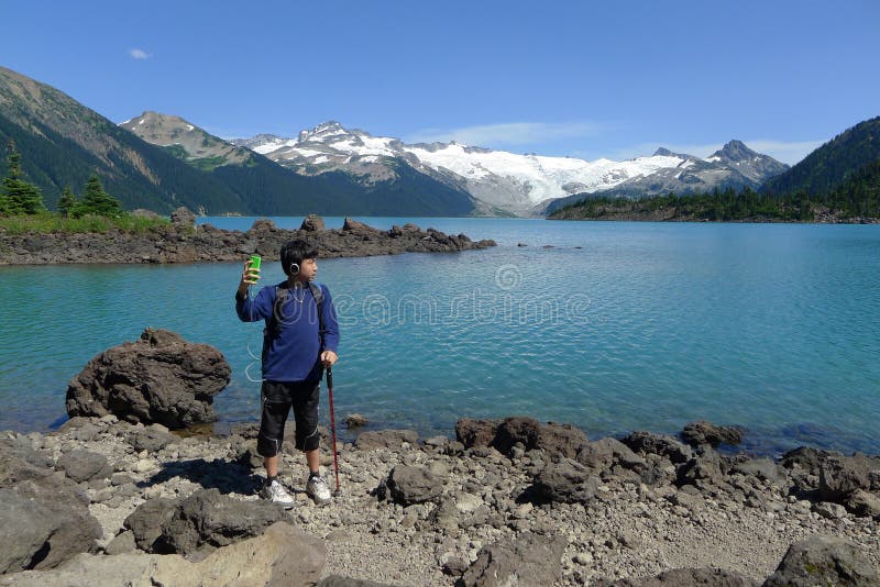 Boy Taking Self Shots at Garibaldi Lake Stock Image - Image of hike ...