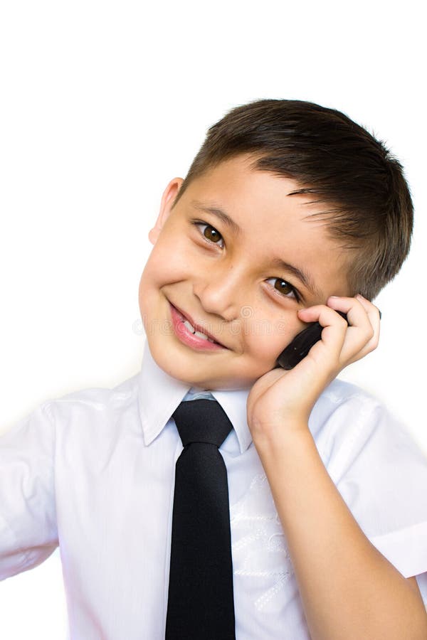 A boy talking on the phone stock image. Image of schoolboy - 25834483