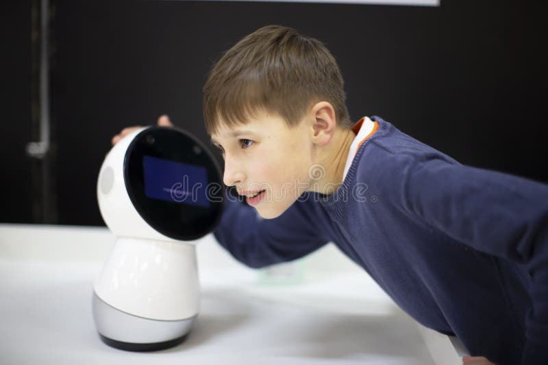 Boy Talking, Playing with Android Robot Stock Image - Image of activity ...