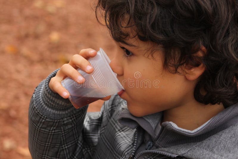 Boy with tea stock photo. Image of hair, healthy, face - 27851116