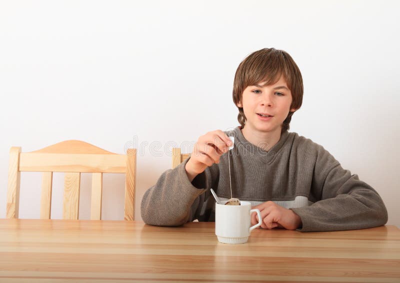 Boy with tea stock photo. Image of breakfast, drinking - 48809030