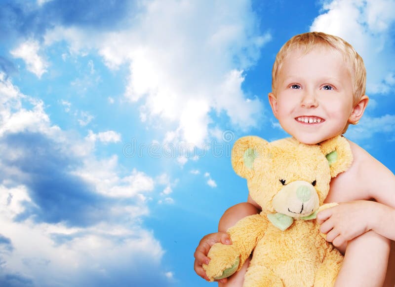 Boy with Teddy Bear on Blue Sky Stock Image - Image of smile, child ...