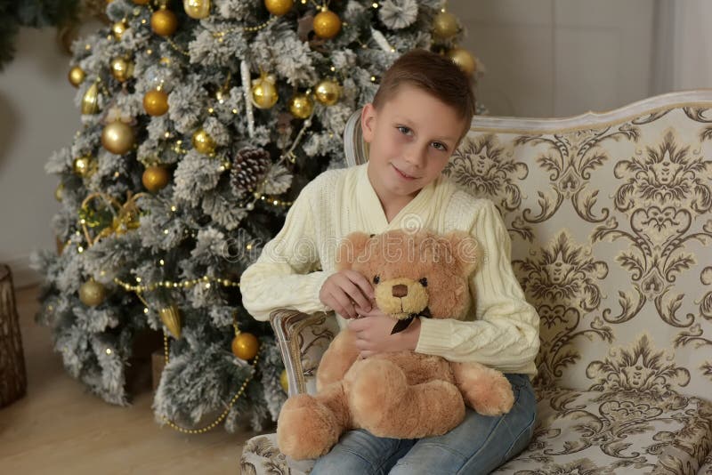 Boy with a Teddy Bear at a Christmas Tree Stock Image - Image of event ...