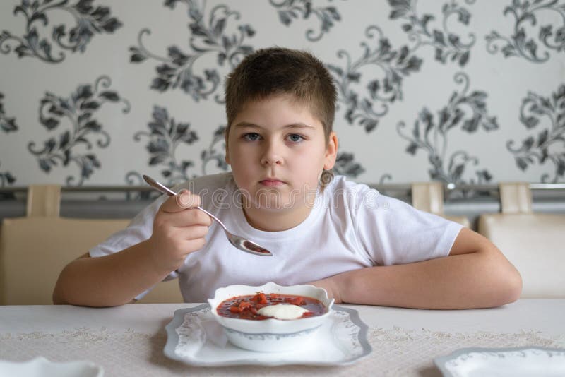 Boy Teenager Eating Soup at Kitchen Table Stock Photo - Image of fresh ...