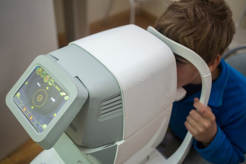 Boy tests his eyes at stock image. Image of health, child - 315405843