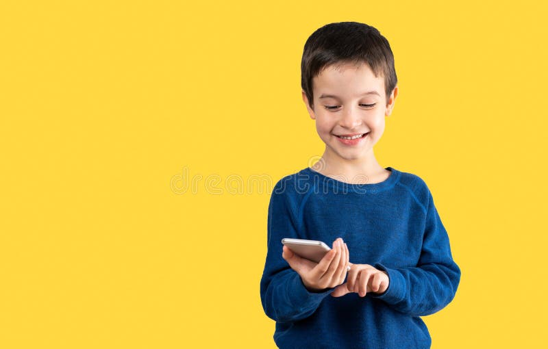 Boy Texting Using a Smart Phone Stock Photo - Image of look, childhood ...