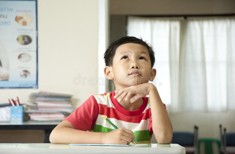 The Boy Thinking in Classroom Stock Image - Image of girl, learn: 20336071