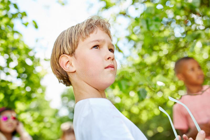 Boy with thinking face stock photo. Image of carefree - 150702626