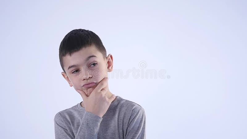Cute Little Boy Making Funny Faces on White Background Stock Footage ...
