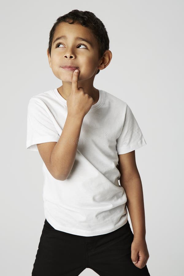 Boy thinking in studio stock image. Image of hair, brown - 50604783