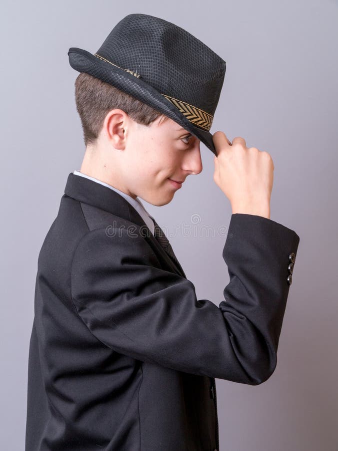 Boy Tipping Hat stock image. Image of youth, acknowledgement - 25169753