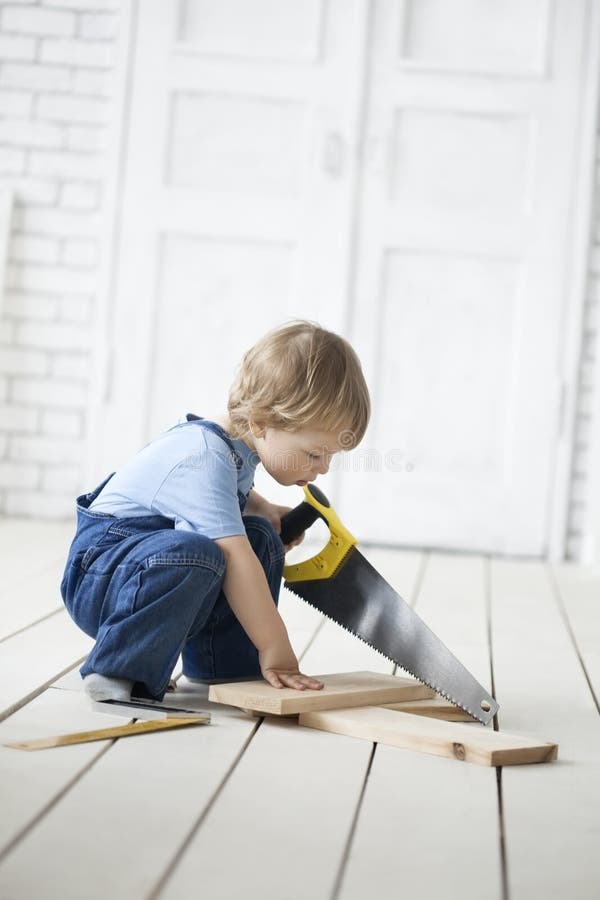 Boy with tool stock photo. Image of bonding, family, horizontal - 67404488