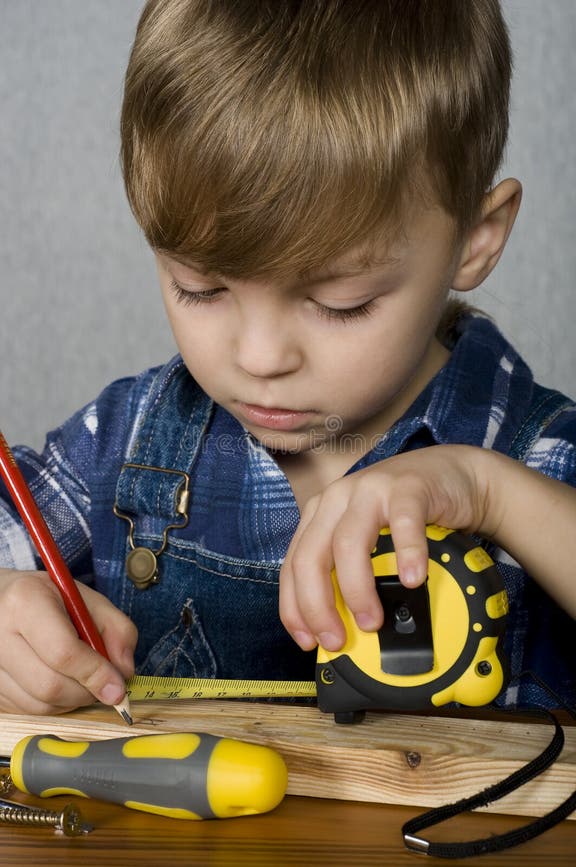 Boy with tools stock image. Image of child, play, construction - 13111467