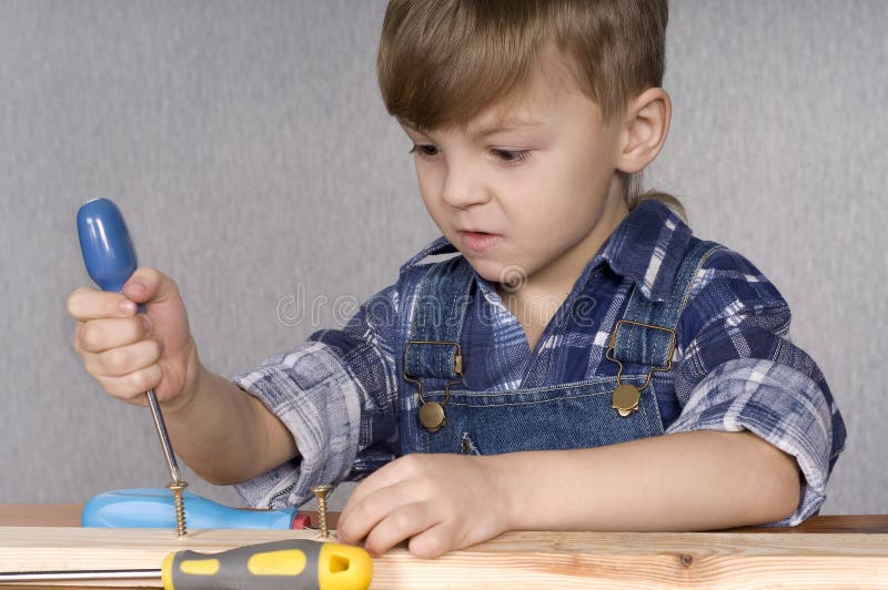 Boy with tools stock photo. Image of metal, carpenter - 13221138
