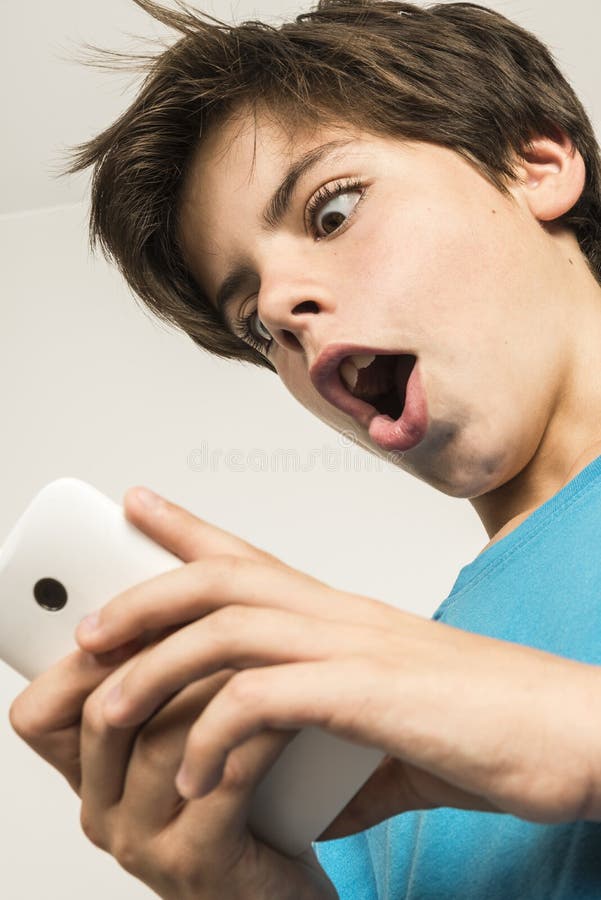 Boy touching a smartphone stock photo. Image of holding - 57099120