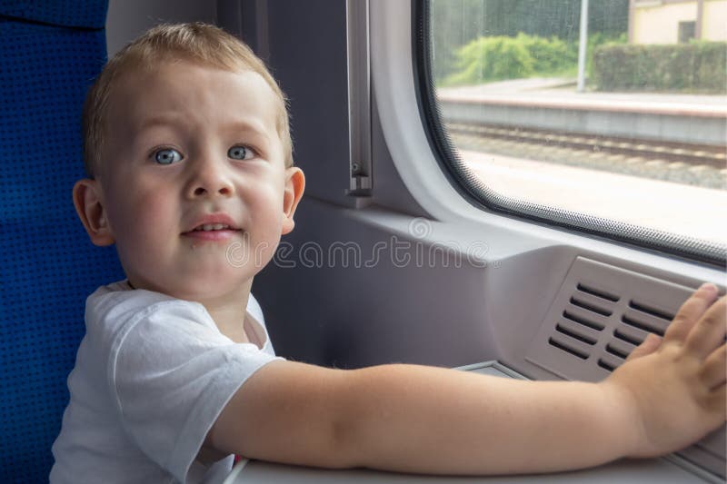 Boy in train stock photo. Image of glass, moving, rail - 47564668