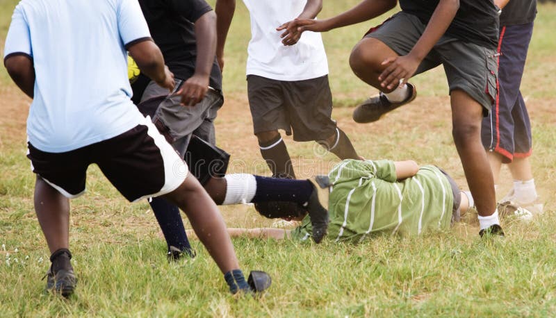 Boy trampled stock photo. Image of moving, fallen, people - 4454792