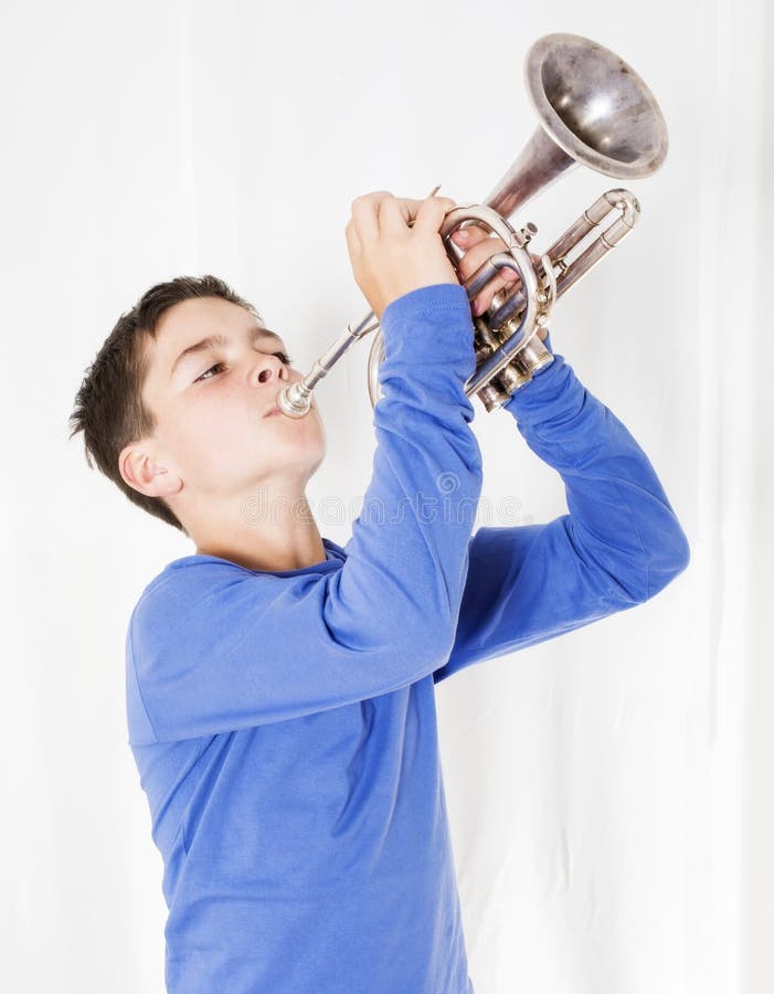 Boy play trumpet stock photo. Image of performance, people - 30213744