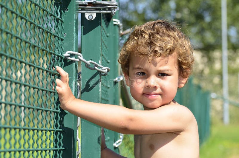 A boy try to escaping stock photo. Image of toddler, freedom - 25861868