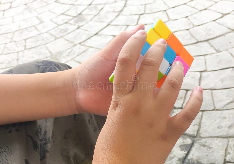 Boy Solving Rubik Cube Stock Photos - Free & Royalty-Free Stock Photos ...